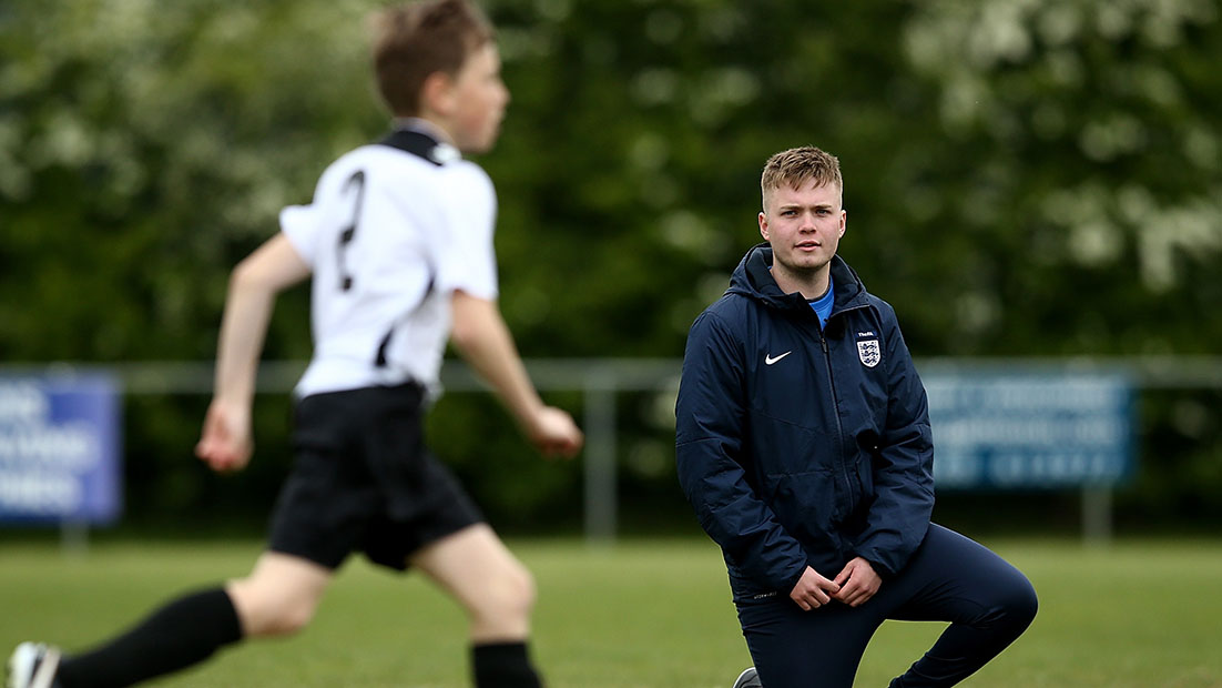 What's the best position to coach from during a practice?